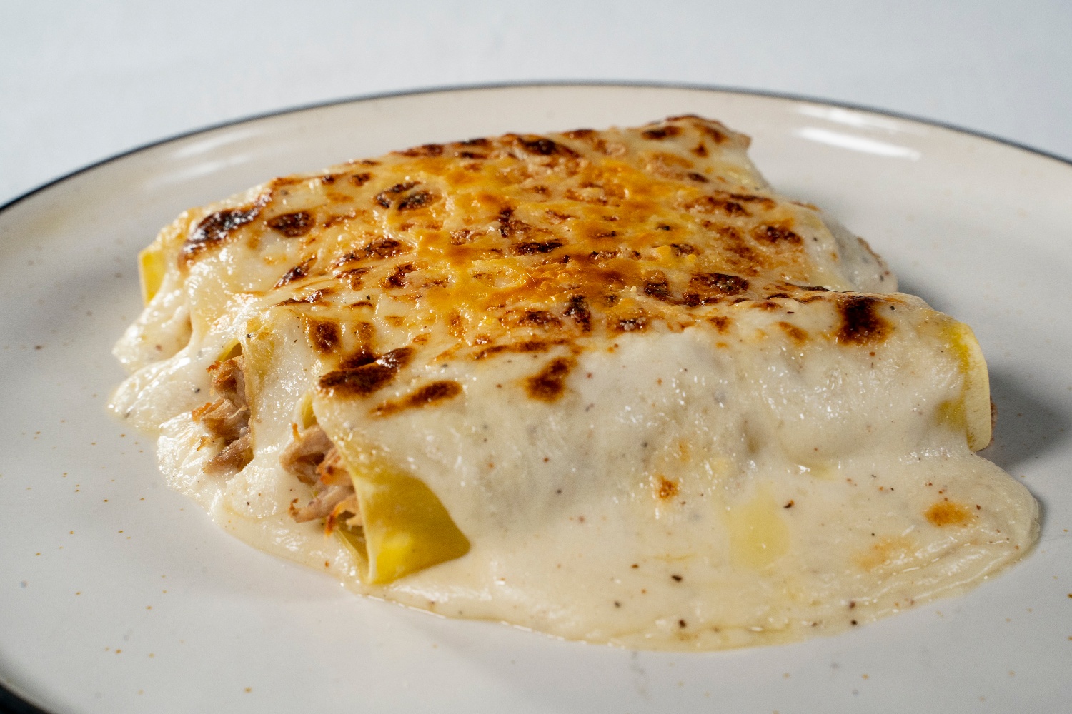 Saborea los canelones de rustido con bechamel trufada de La Quinta Food